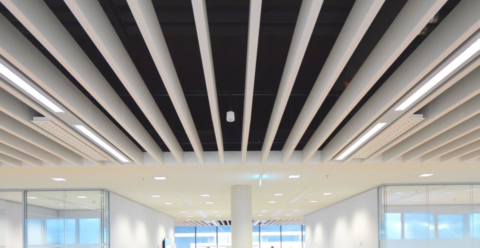How Baffles Ceilings Improve Sound Control in Busy Commercial Spaces