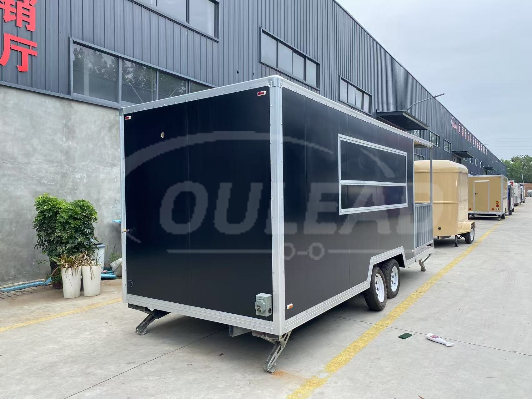 Black Dual - Axle Food Trailer with Metal Railing and Expanded Serving ...