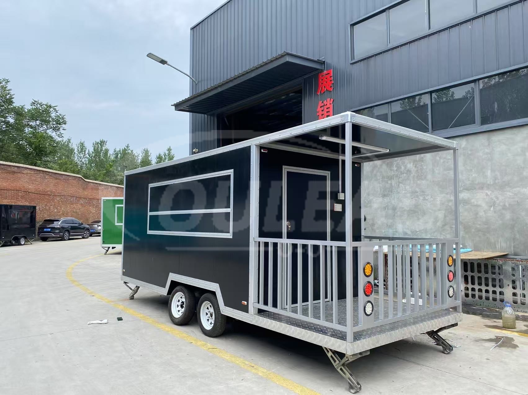 Black Dual - Axle Food Trailer with Metal Railing and Expanded Serving ...