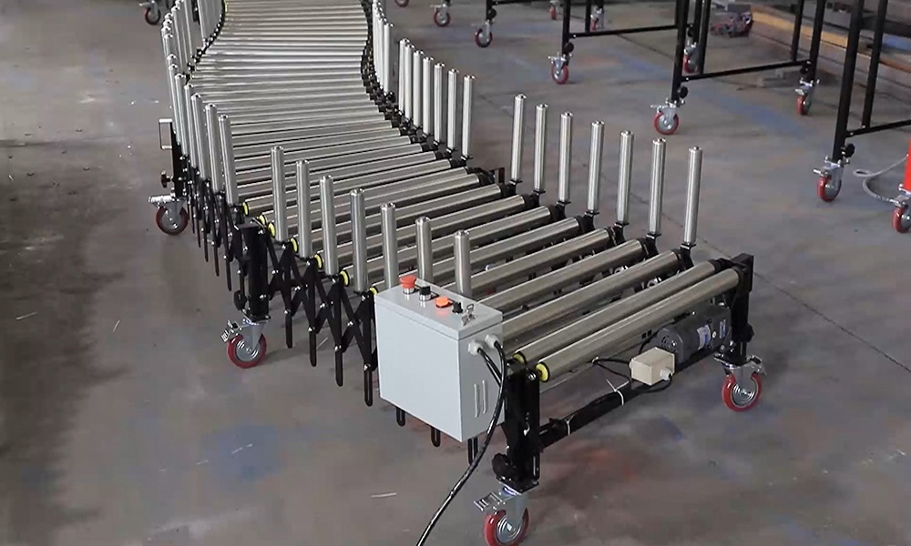 Transportador de rodillos motorizado extensible con rodillos guía ...