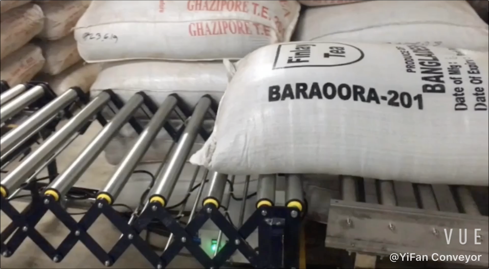 Extendable Power Roller Conveyor with Side Guide Rollers | Yifan Conveyor Extendable Power Roller Conveyor with Side Guide Rollers | Yifan Conveyor